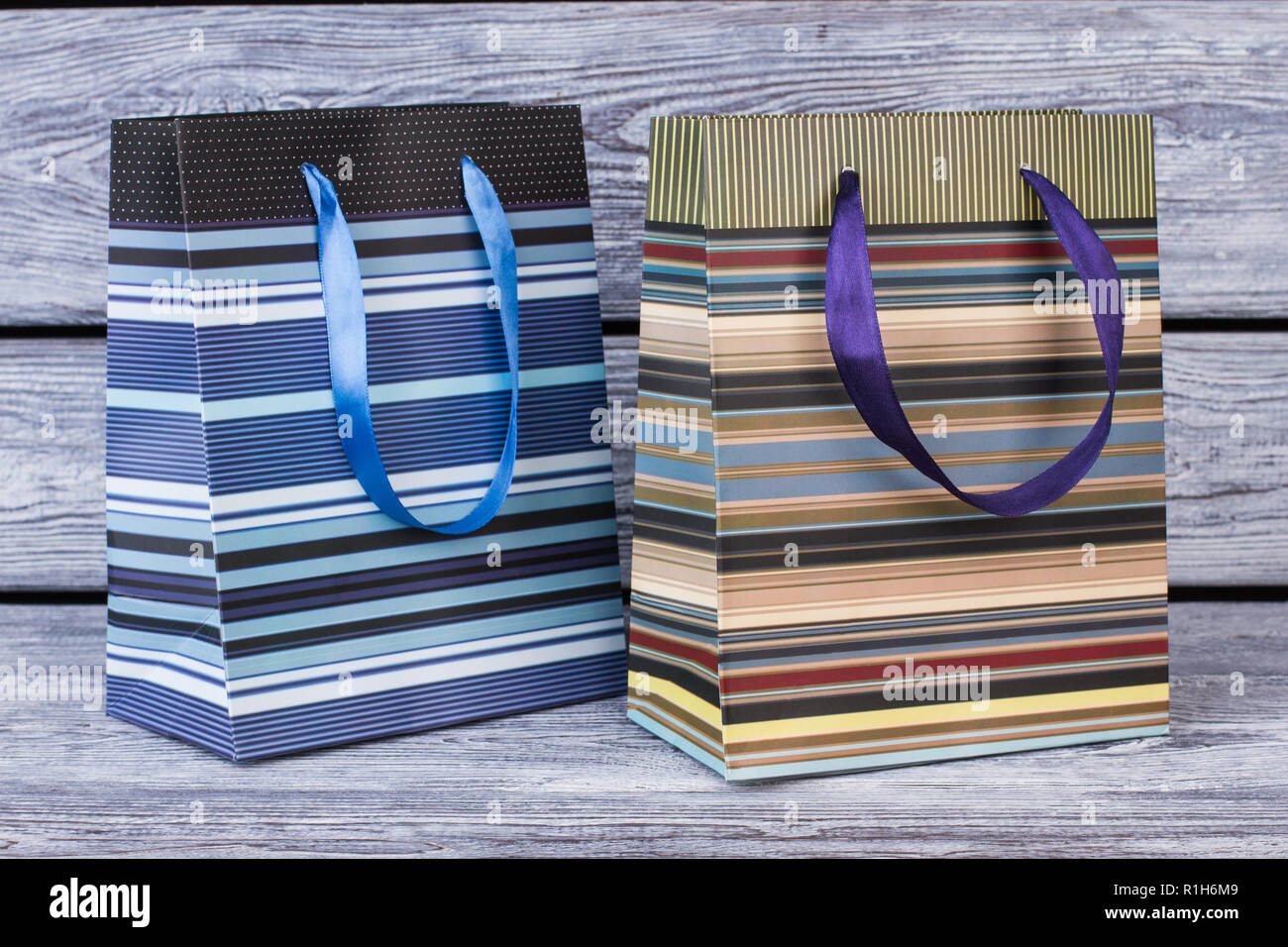Two striped shopping bags hi-res stock photography and images - Alamy