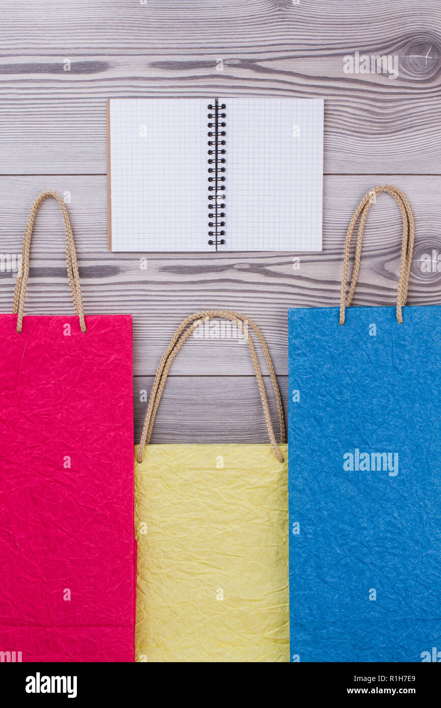 Colorful paper gift bags with handles Stock Photo - Alamy