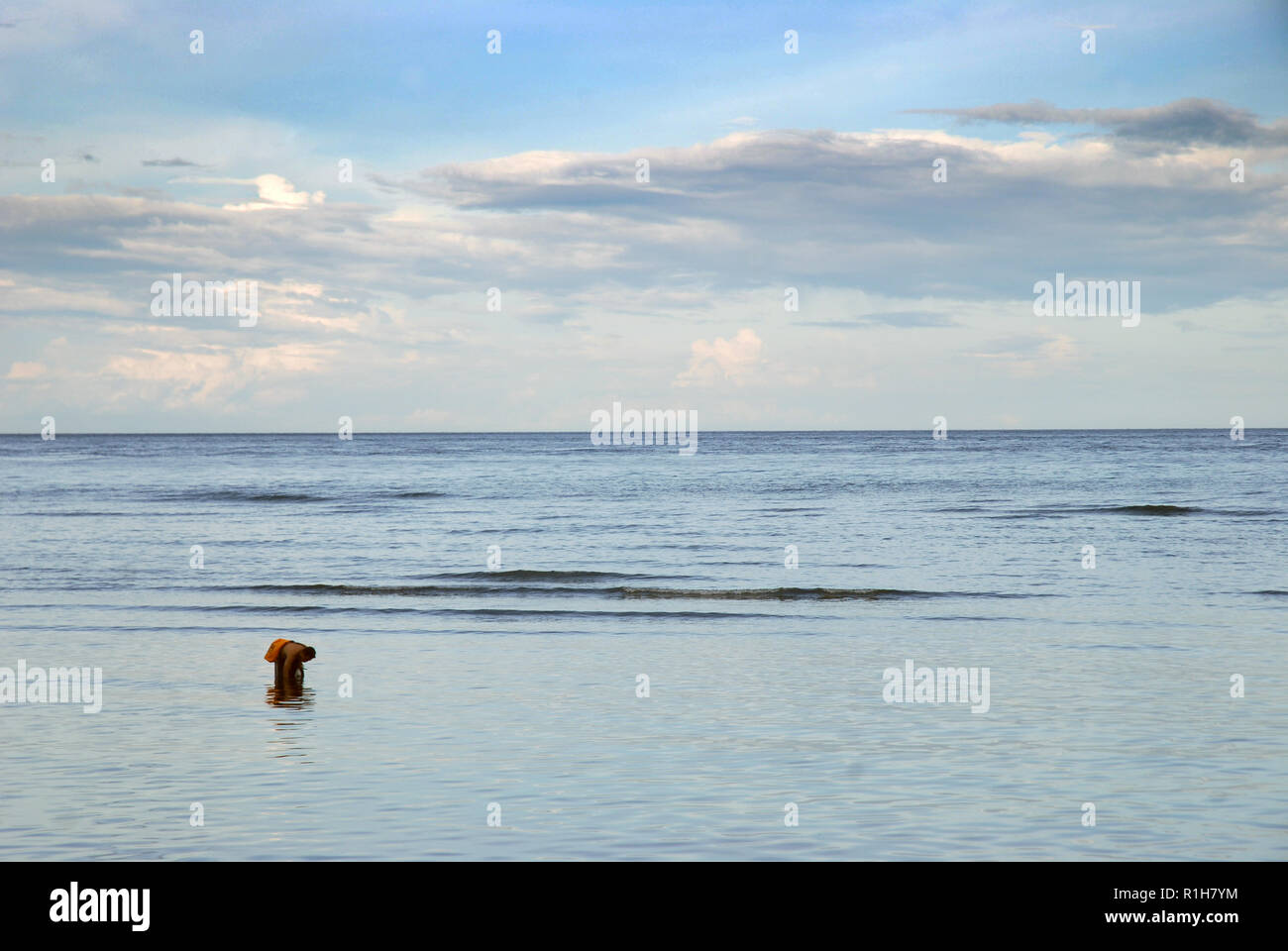 People fishing in sea, Escano Beach, Dumaguete, Negros Oriental ...