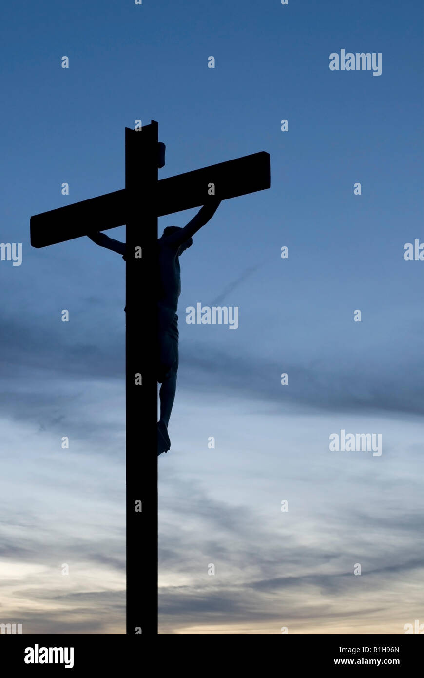 Holy Jesus Christ on the Cross With Sunset and Blue Sky Viewed from the ...