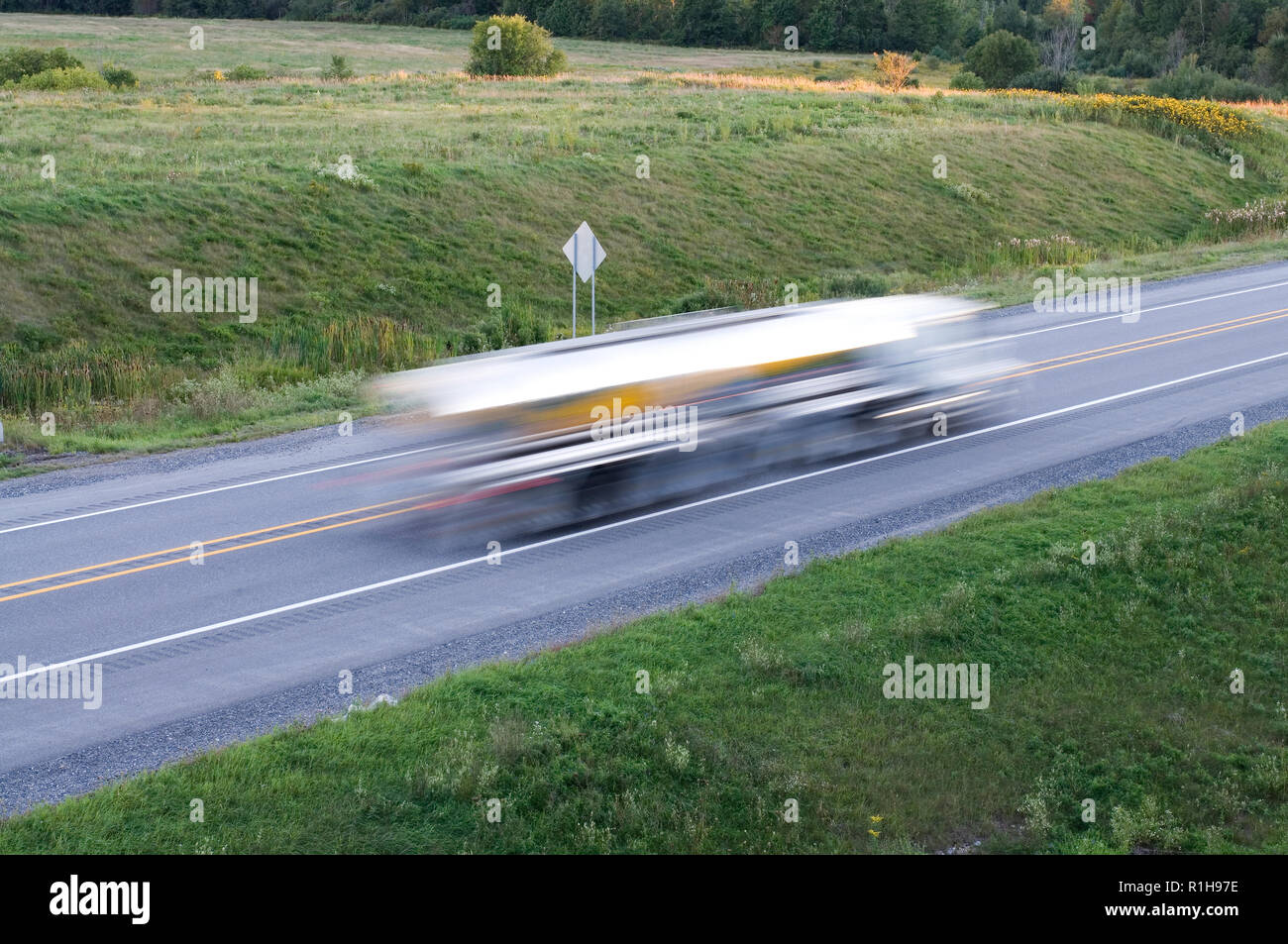 White Tractor Trailer in Motion on a Major Highway Stock Photo - Alamy