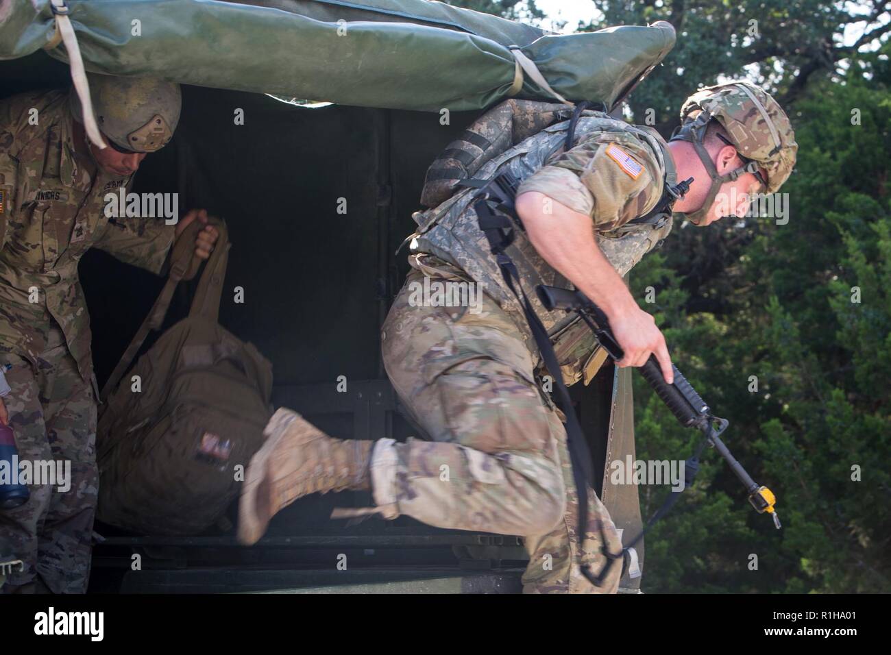 Sgt. Nathan Davis, Airborne Ranger Training Brigade, races to remove an ...