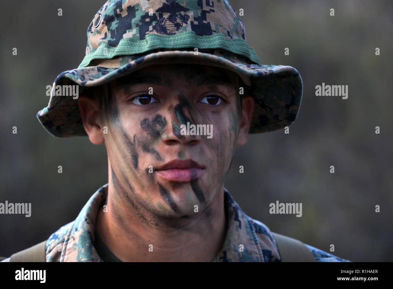Lance Cpl. Ray Ramos, a graphics and reproduction specialist for ...