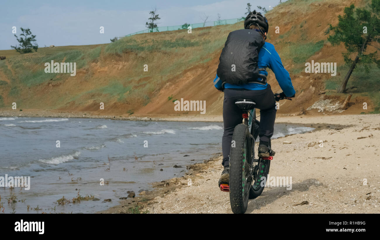 Fat bike also called fatbike or fat-tire bike in summer driving on the ...