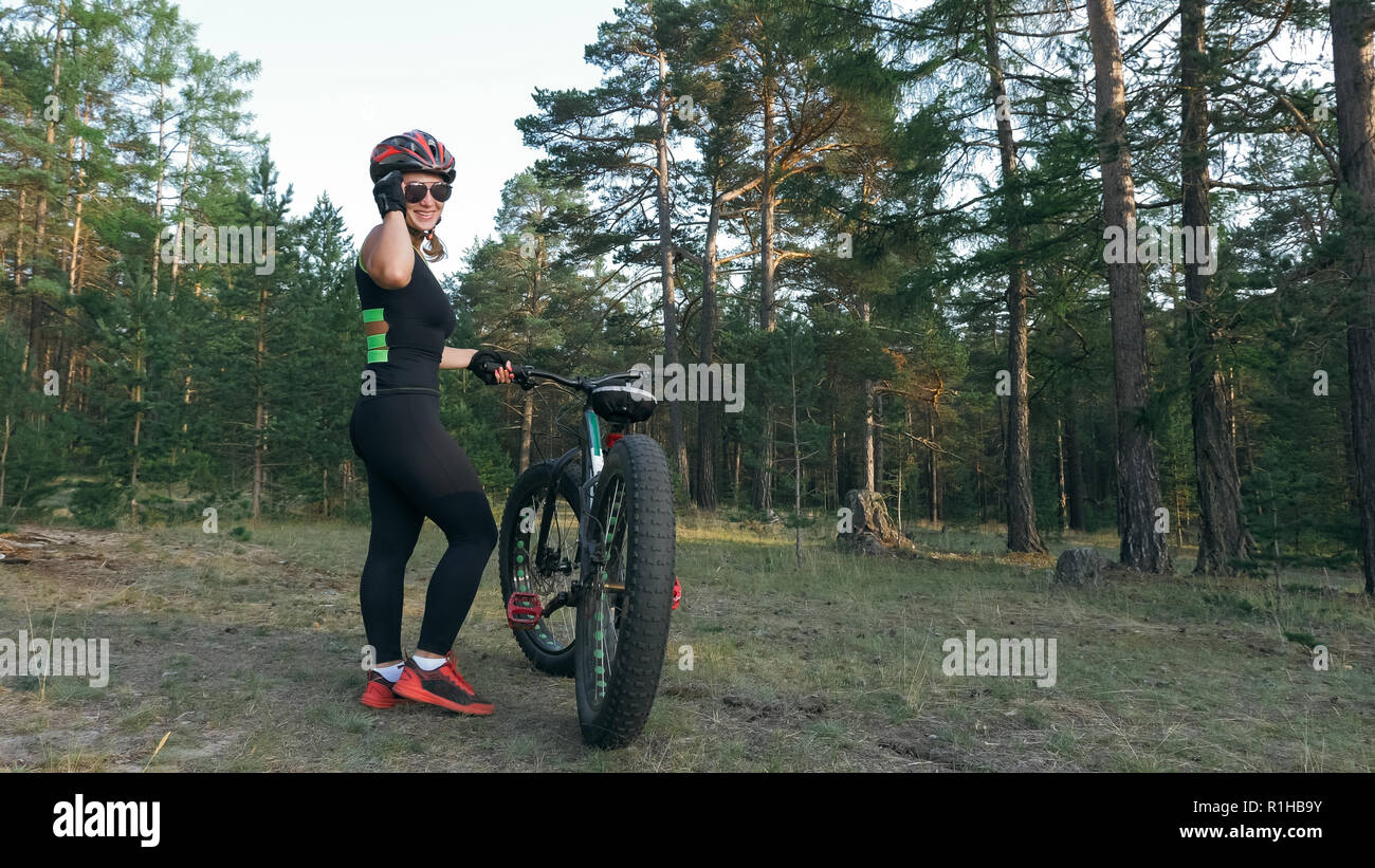 Fat bike also called fatbike or fat-tire bike in summer riding in the ...