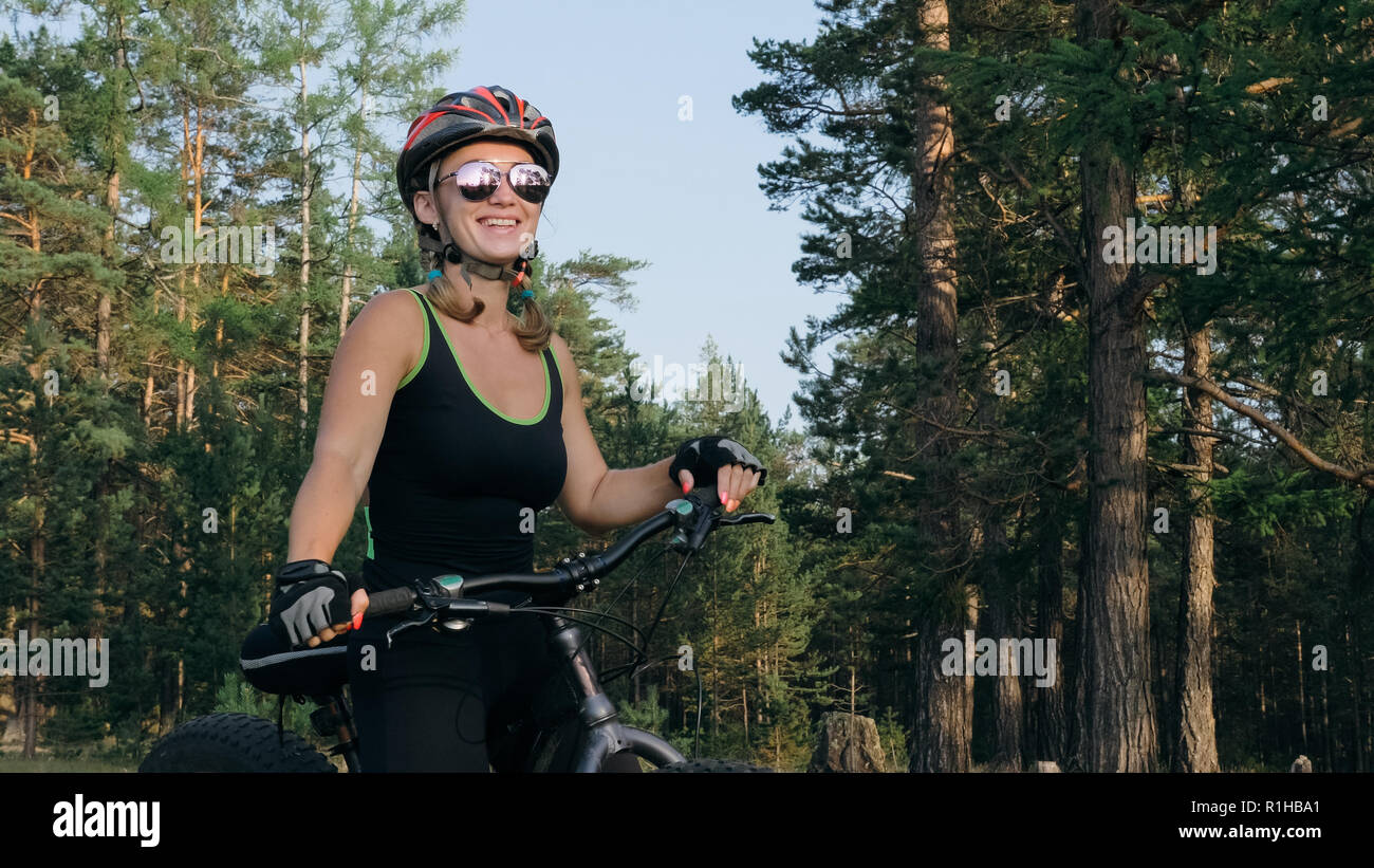 Fat bike also called fatbike or fat-tire bike in summer riding in the ...