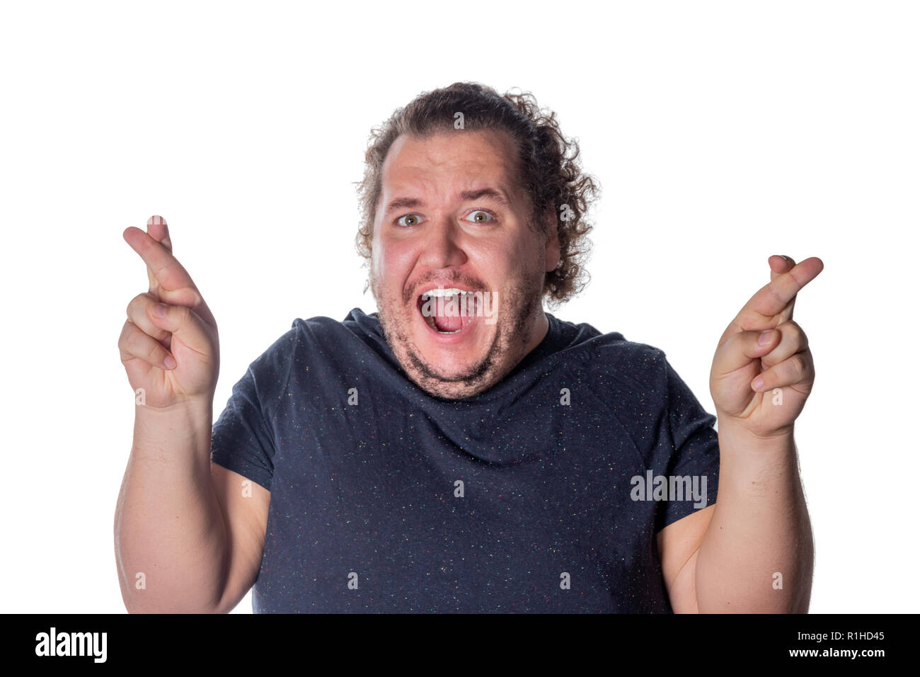 Funny fat man waiting for special moment and crossing fingers Stock ...