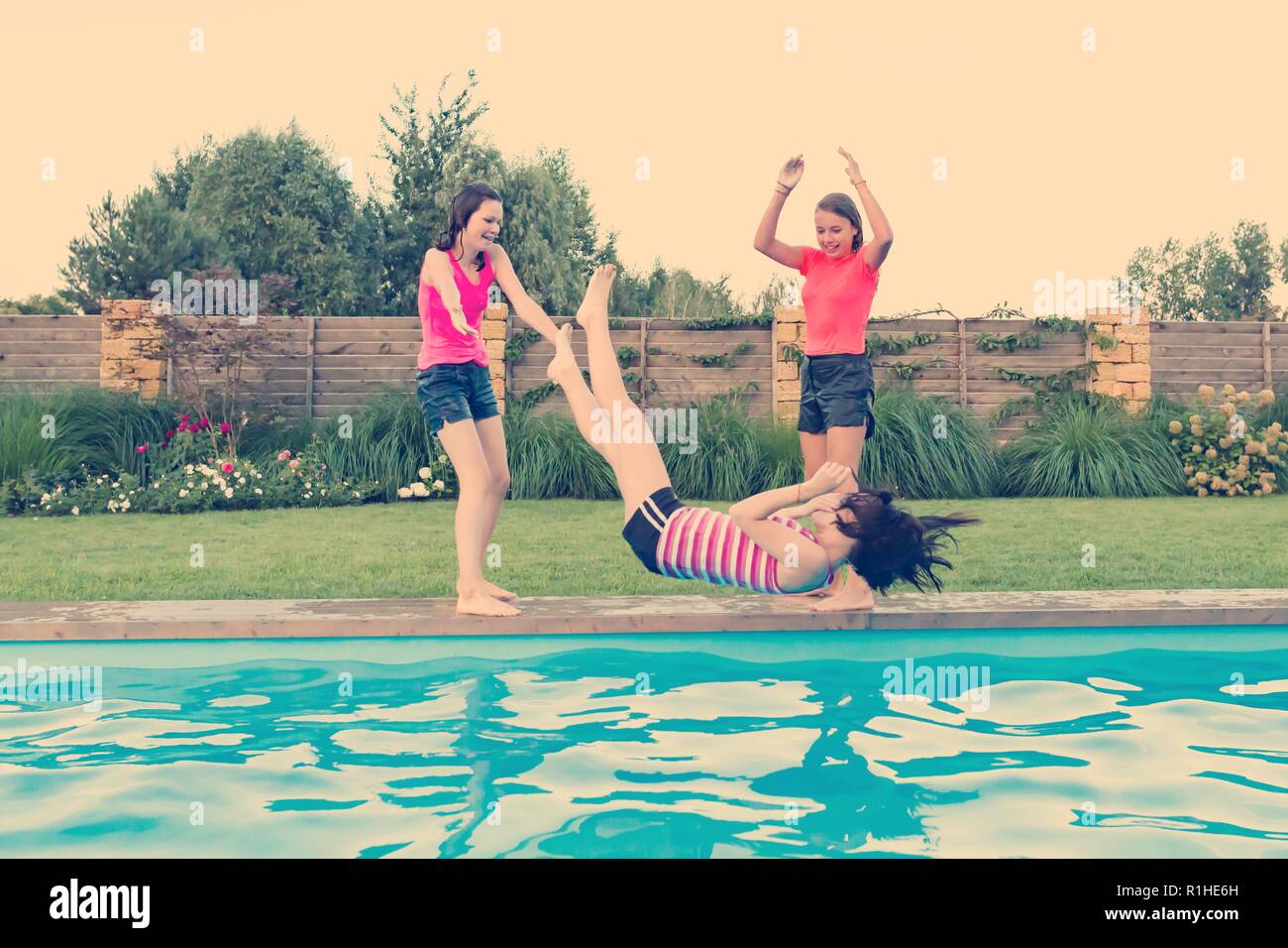 Teenagers group swimming pool hi-res stock photography and images - Alamy