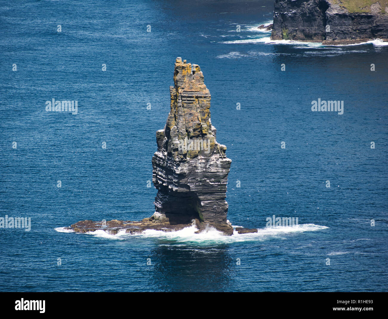 Standing Rock in the Atlantic Ocean near Ireland at the Cliff of Moher ...