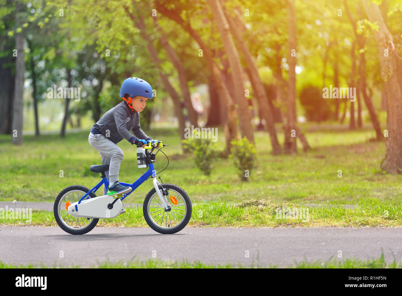 Boy cycle hi-res stock photography and images - Alamy