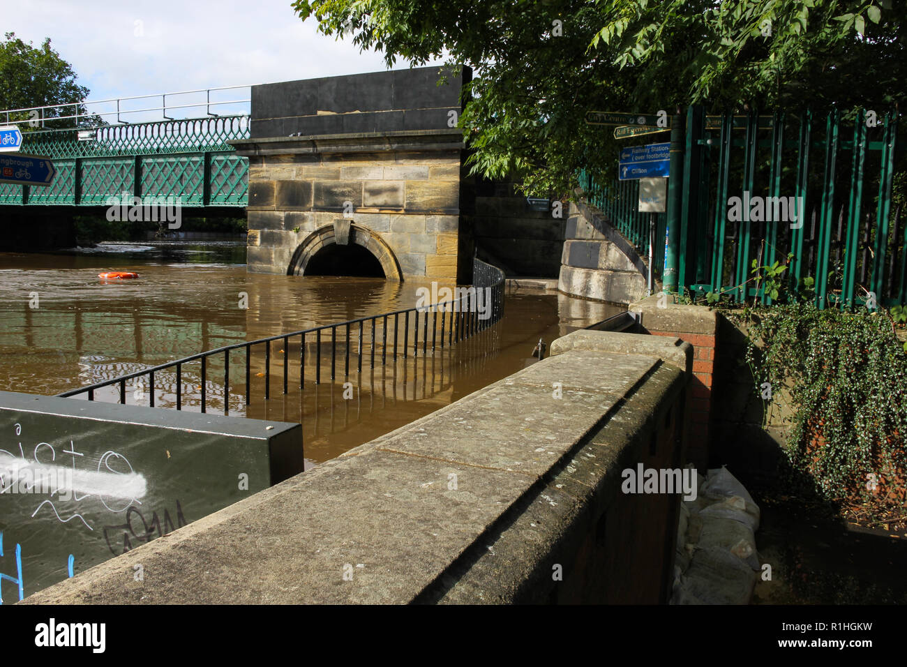 Heavy flooding near Scarborough Bridge seen over the flood defences in ...