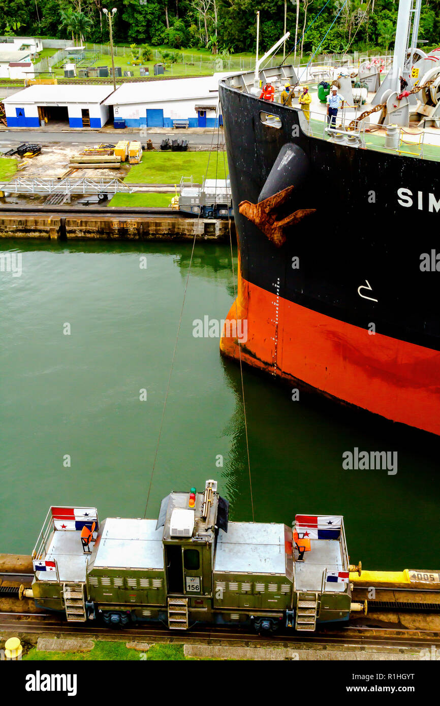 Locomotive with bulk carrier MV Simurgh in the background at the Panama ...