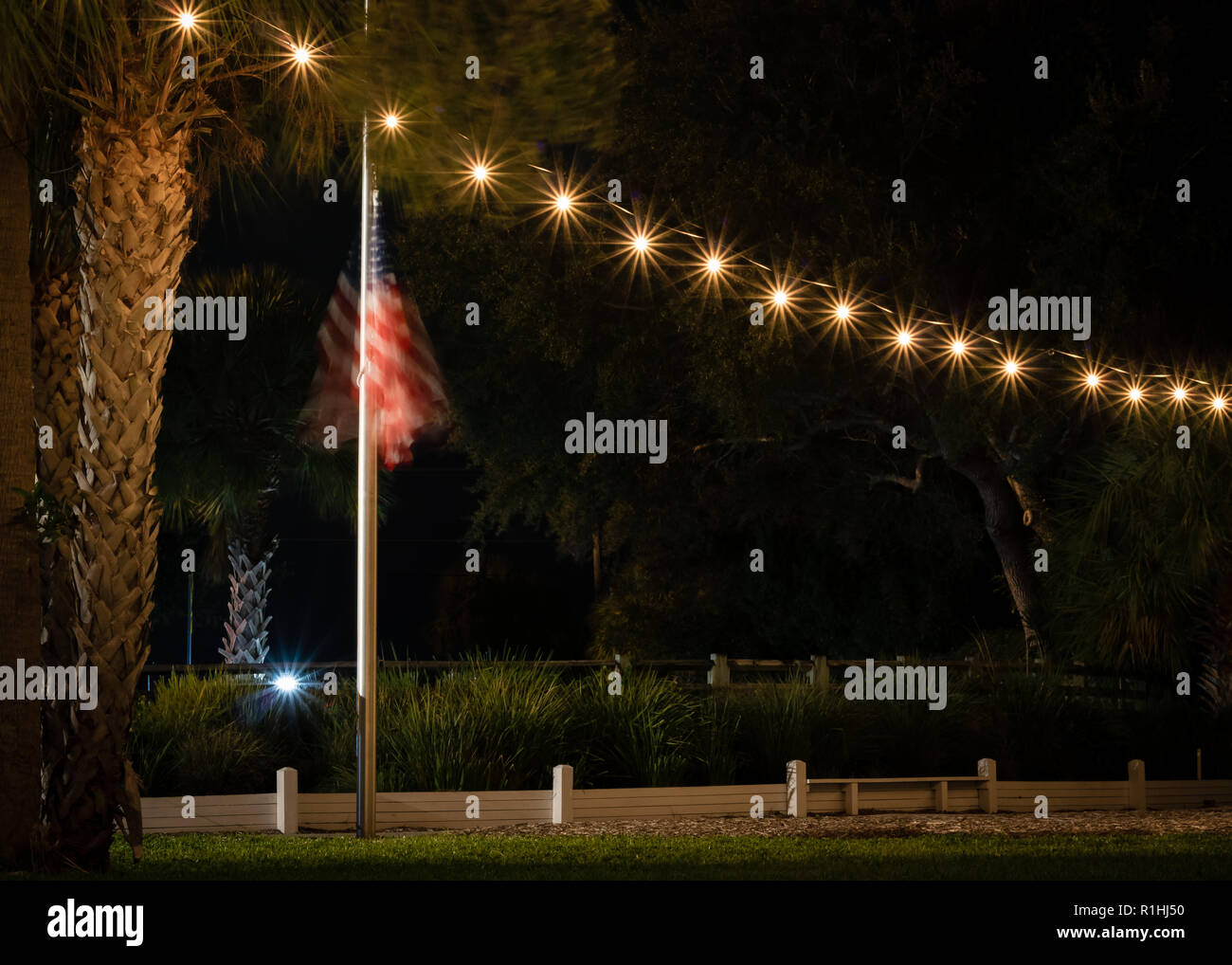 American Flag Through the Night Stock Photo - Alamy
