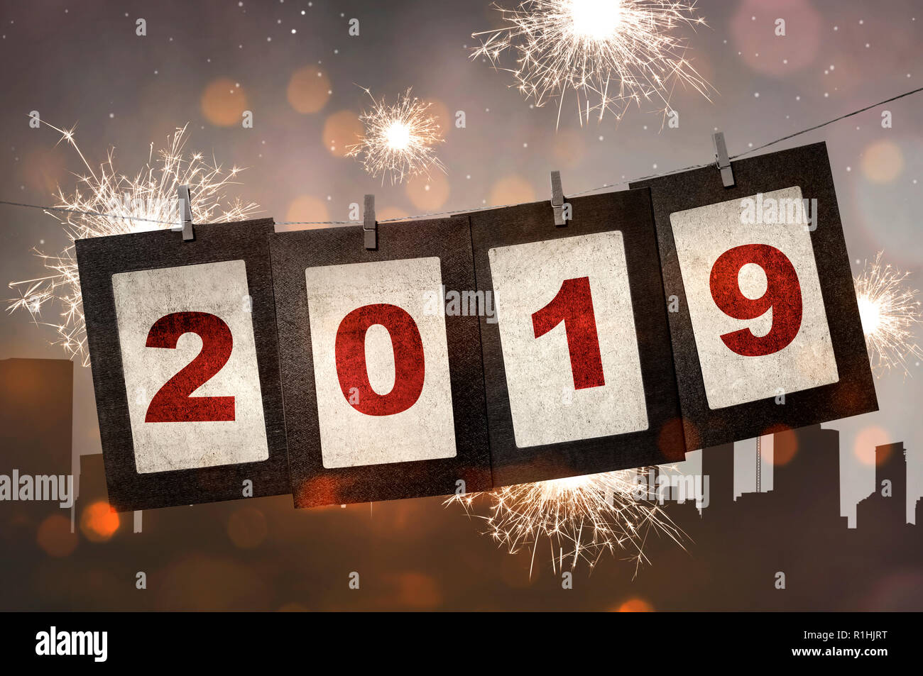 Hanged paper on the rope with 2019 number display over fireworks ...
