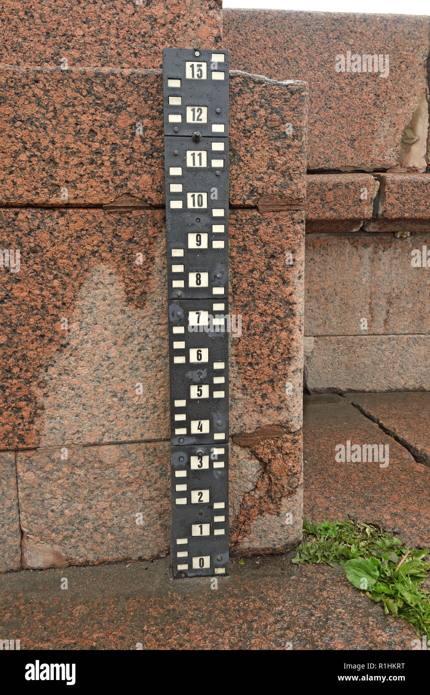 Scale of water level is established on the granite embankment of the ...