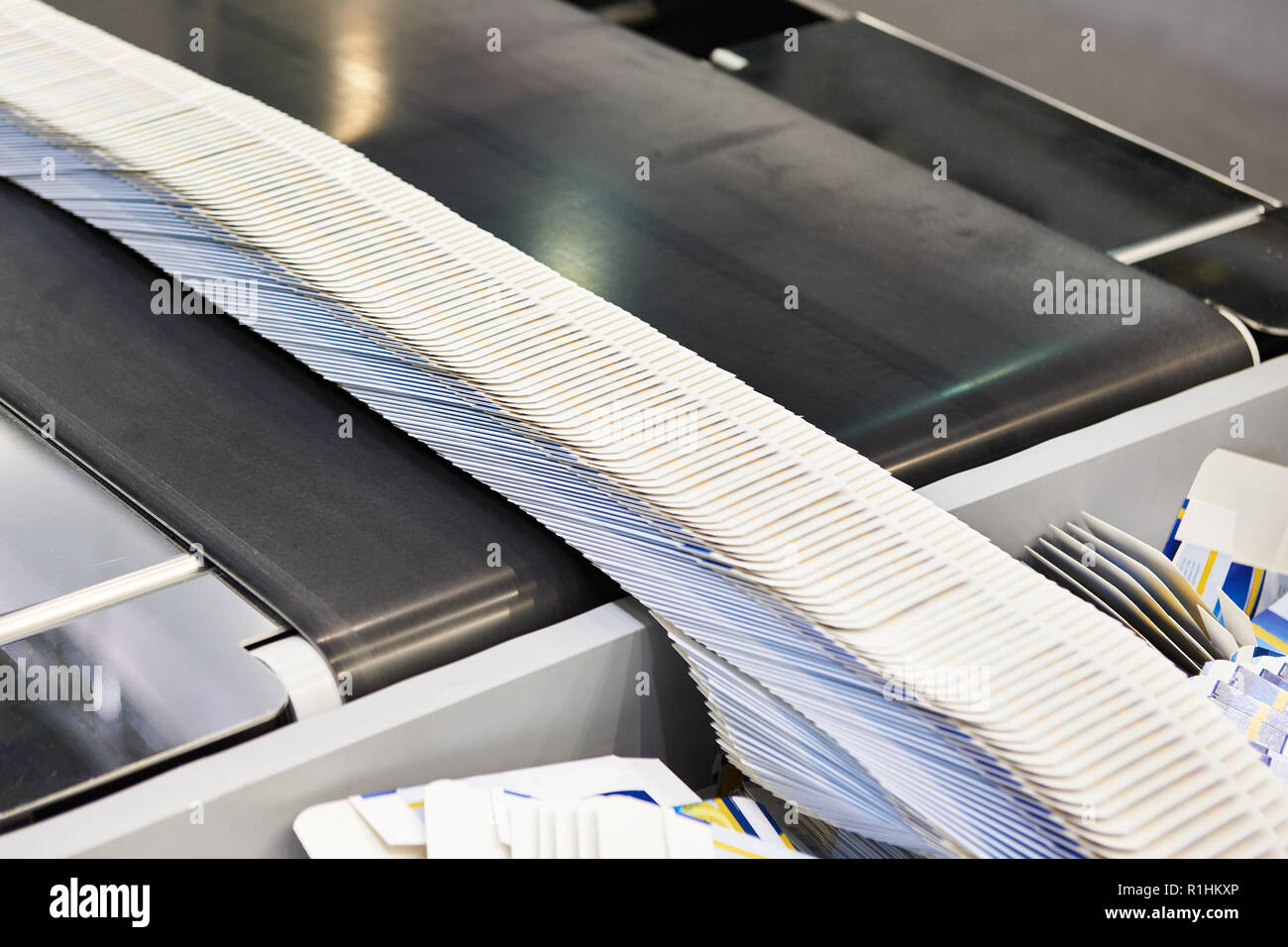Working conveyor in a packing factory Stock Photo - Alamy
