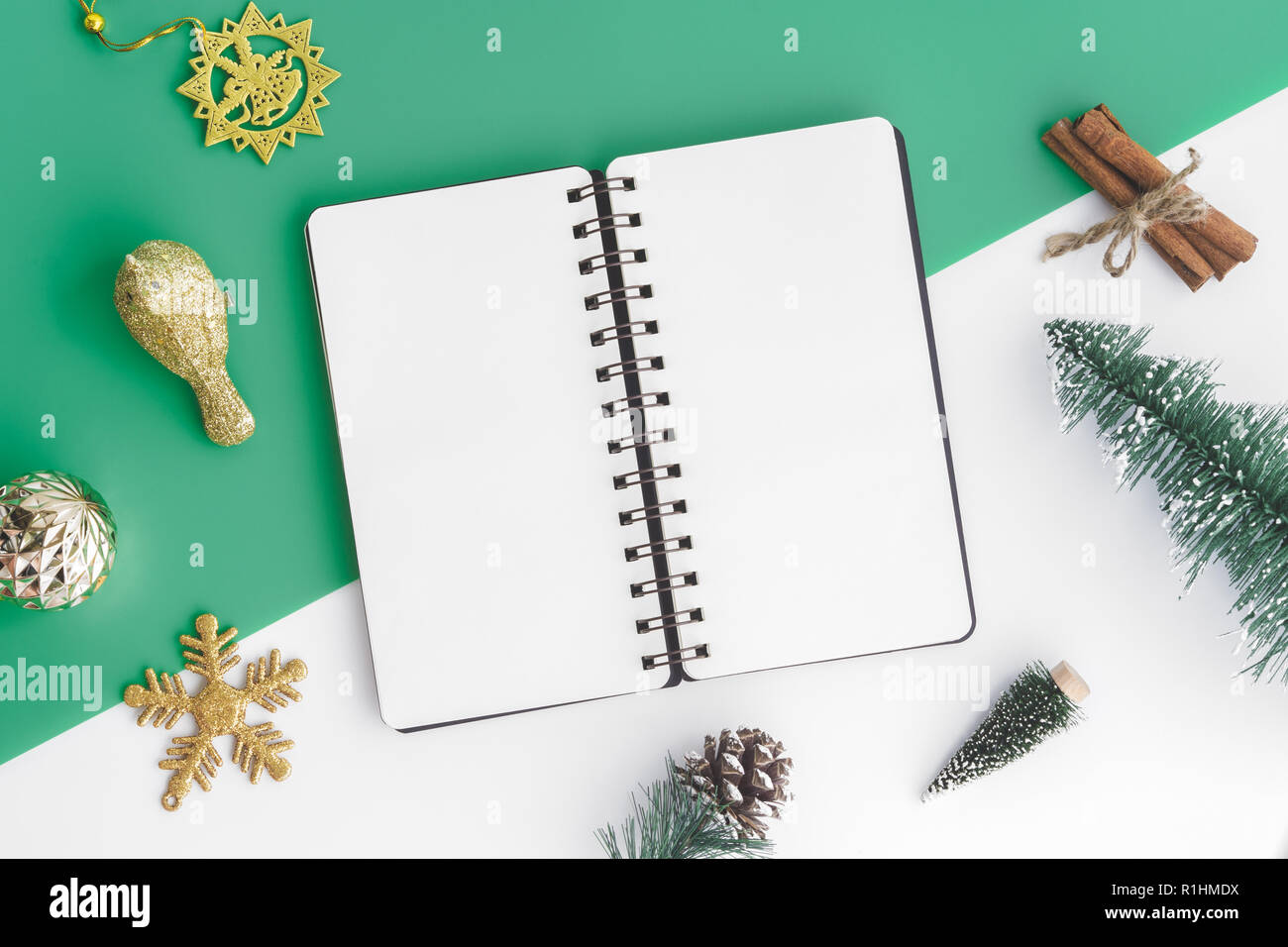 Creative flat lay of craft and blank notebook mock up with christmas ...
