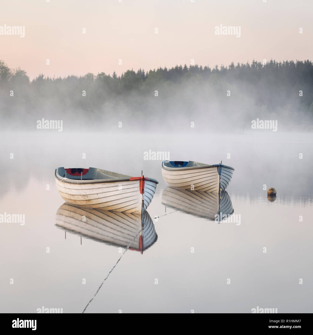 Fishing boat reflection Stock Photo - Alamy