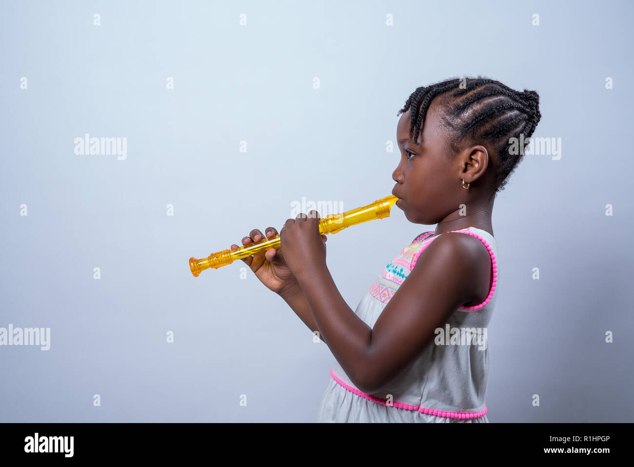 Little girl with recorder Stock Photo - Alamy