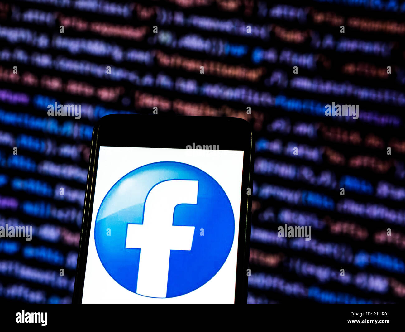 Facebook logo on mobile phone hi-res stock photography and images - Alamy