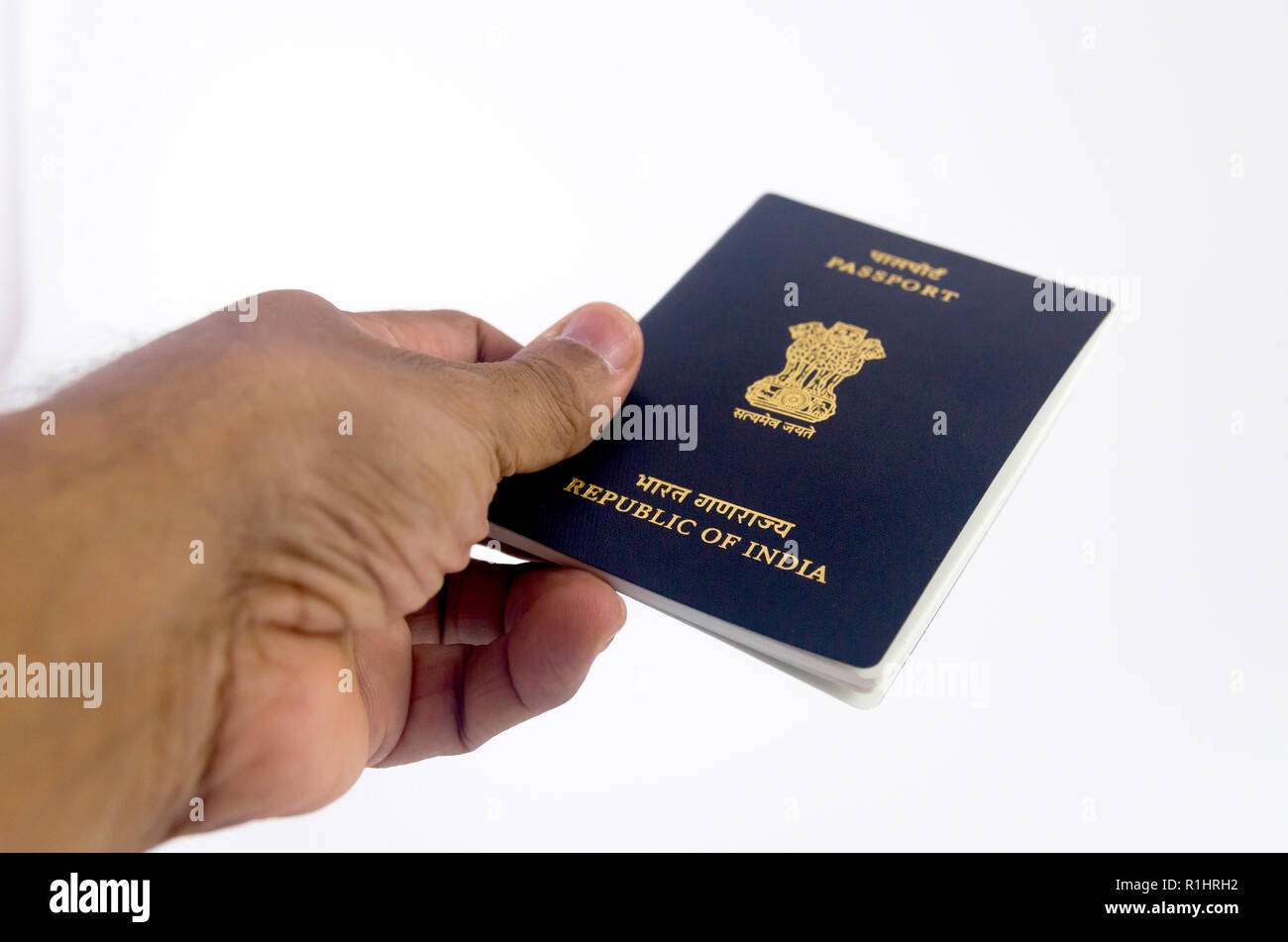 Single Indian Passport with white background Stock Photo - Alamy