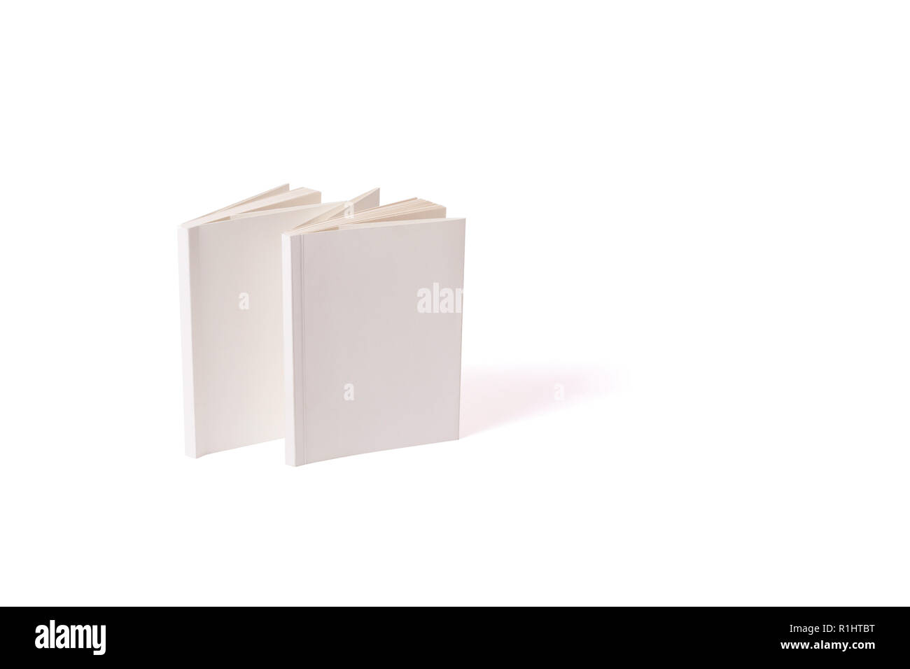 Standing opened mockup book. Side view Stock Photo - Alamy