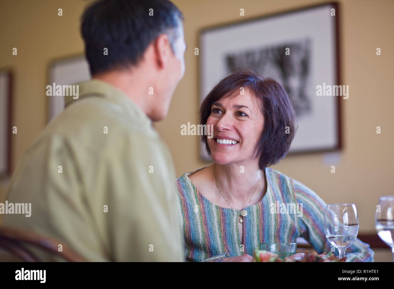 Woman sitting across man rear hi-res stock photography and images - Alamy