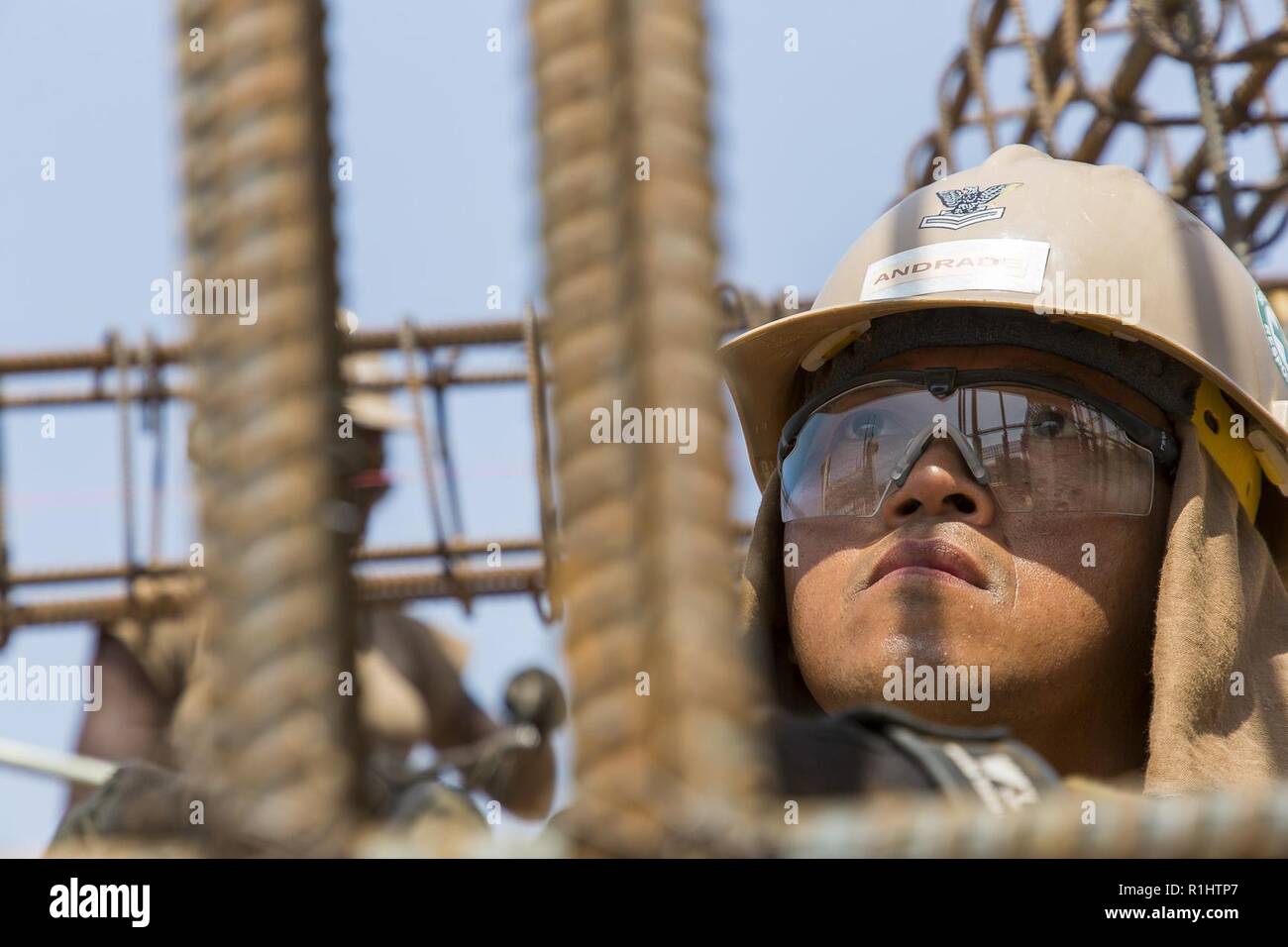 U.S. Navy Builder 2nd Class Gildardo Andrade, a Seabee assigned to ...