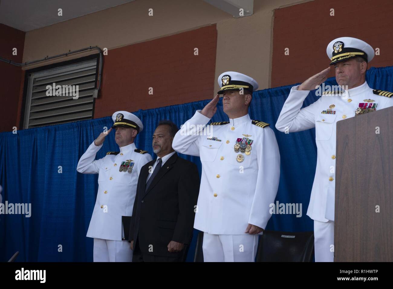 NORFOLK (Sept. 21, 2018) – Special guests salute the ensign during the ...