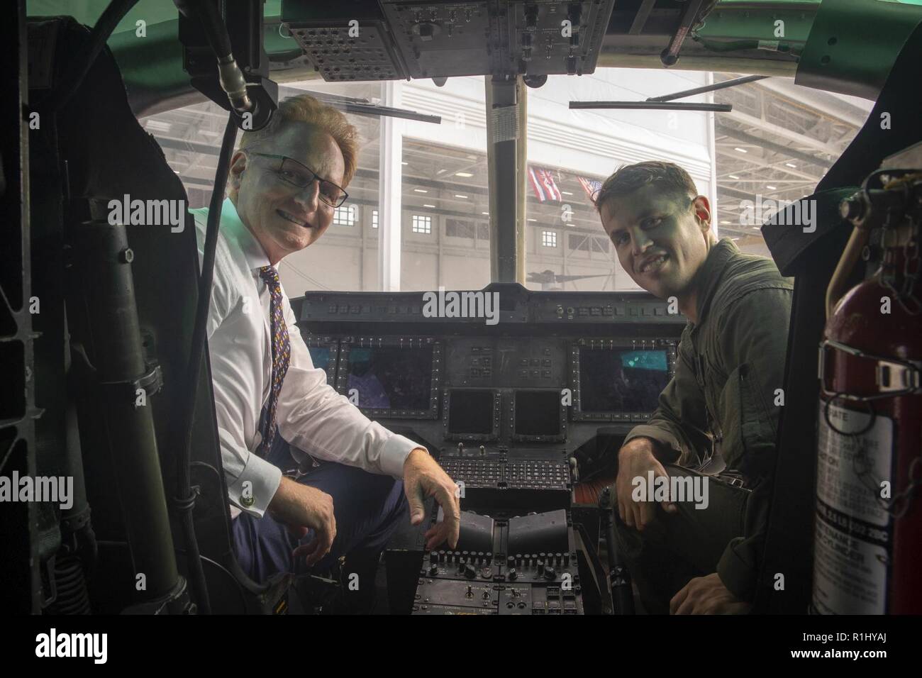 Under Secretary of the Navy, the Honorable Thomas B. Modly, poses for a ...