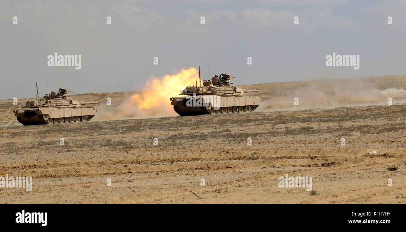 MOHAMED NAGUIB MILITARY BASE, Egypt – Fire erupts from the barrel of an ...
