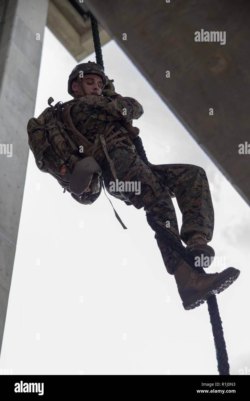 U.S. Marine descends during helicopter rope suspension technique ...