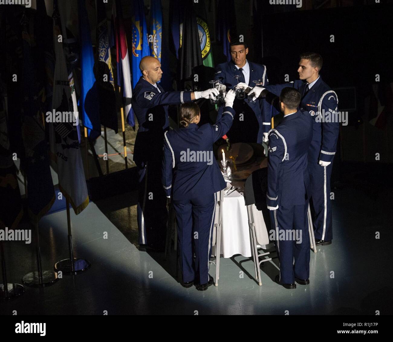 Members of the Eglin Honor Guard perform missing man table honors ...