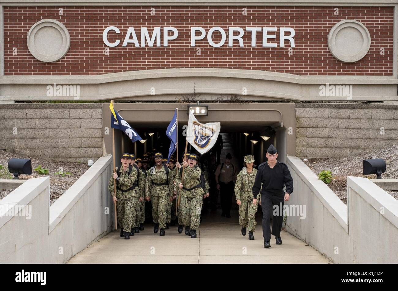 GREAT LAKES, Ill. (Sept. 25, 2018) Recruits march and sing "Anchors ...
