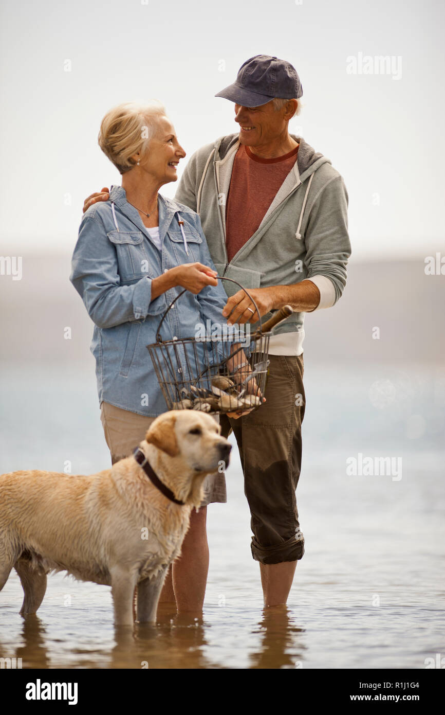 Joyful elderly couple stands outside hi-res stock photography and ...