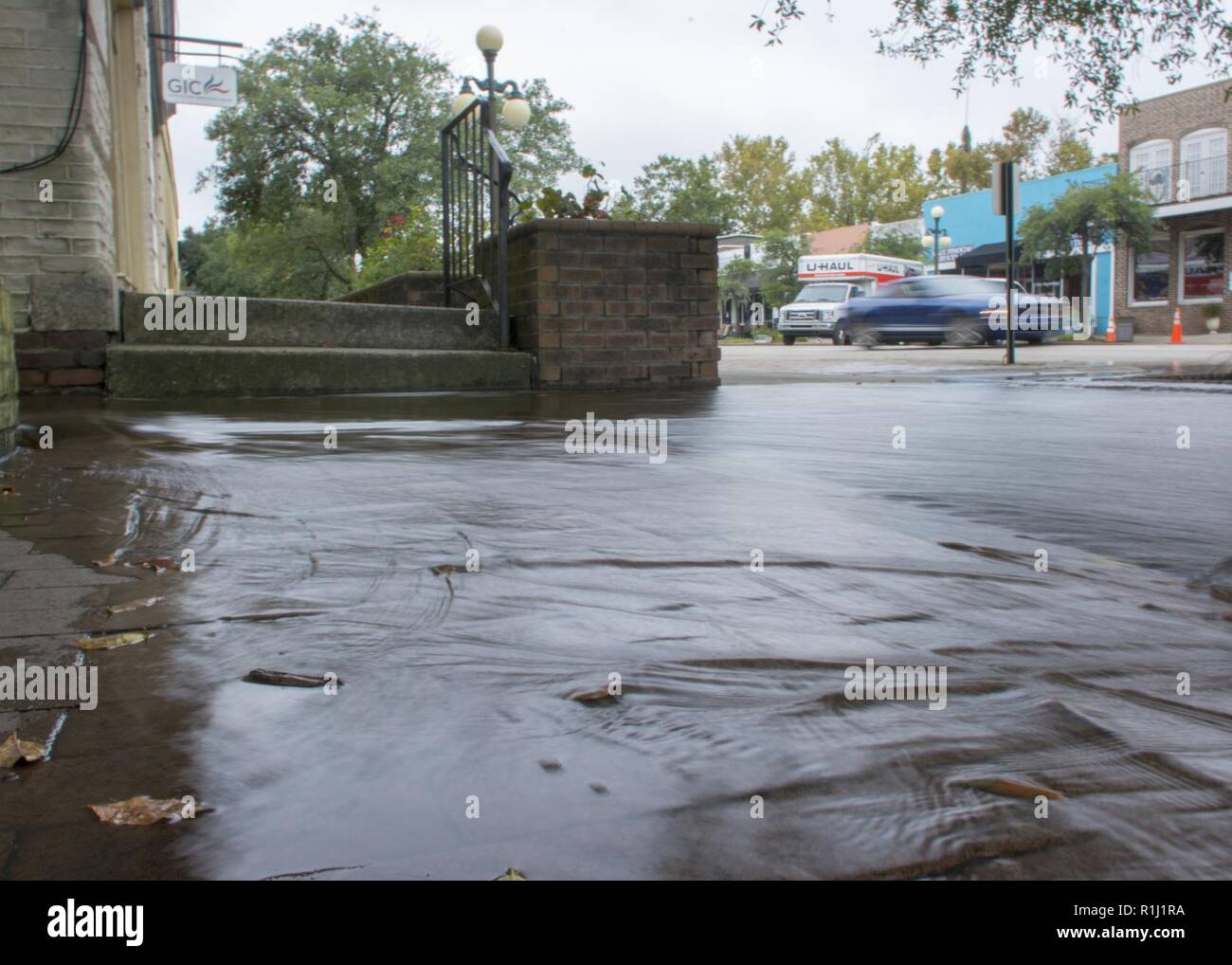 As the tide rises water begins to flood the streets of the Historic ...