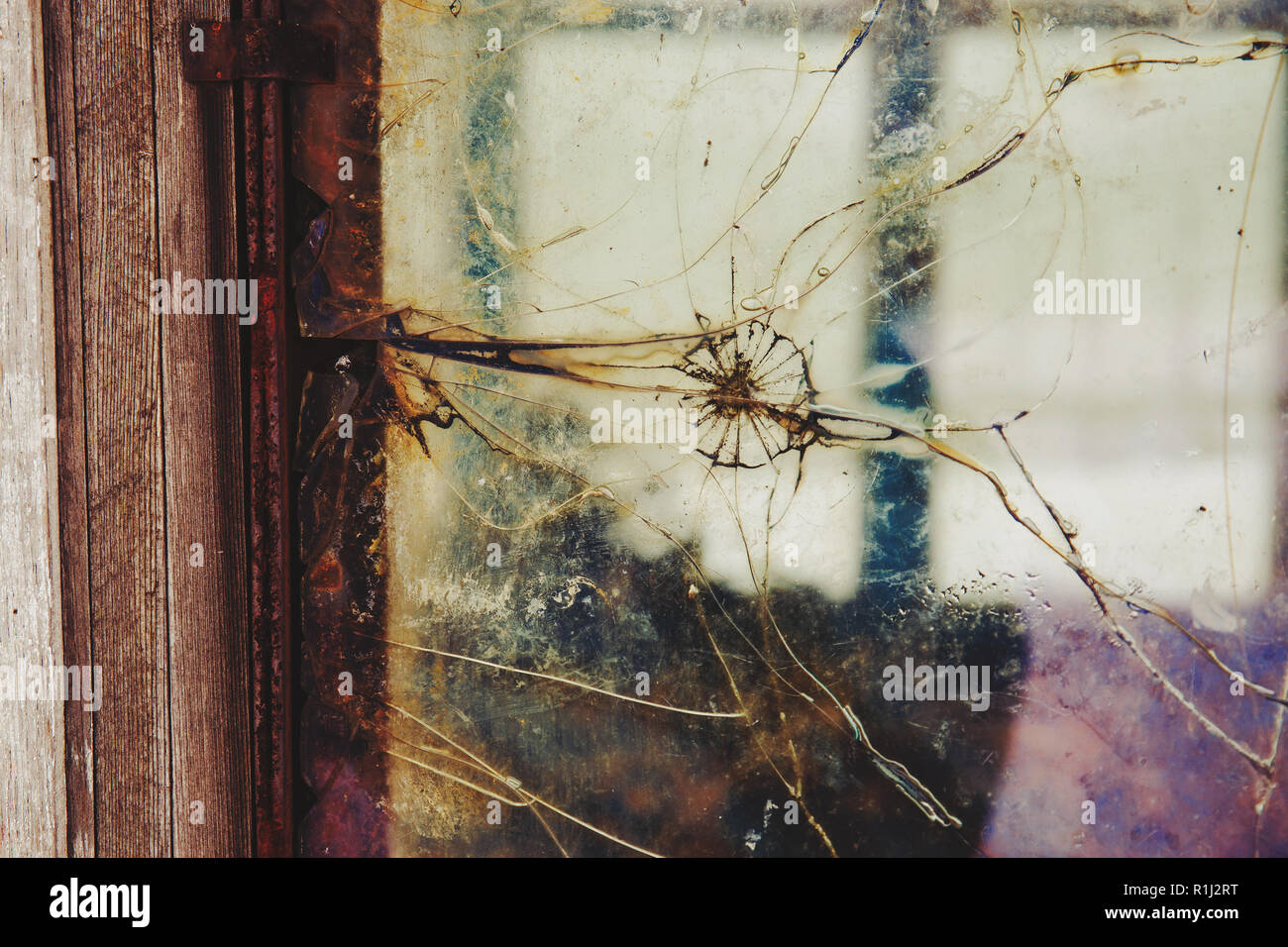 Old dirty cracked and broken window, toned Industrial background Stock ...