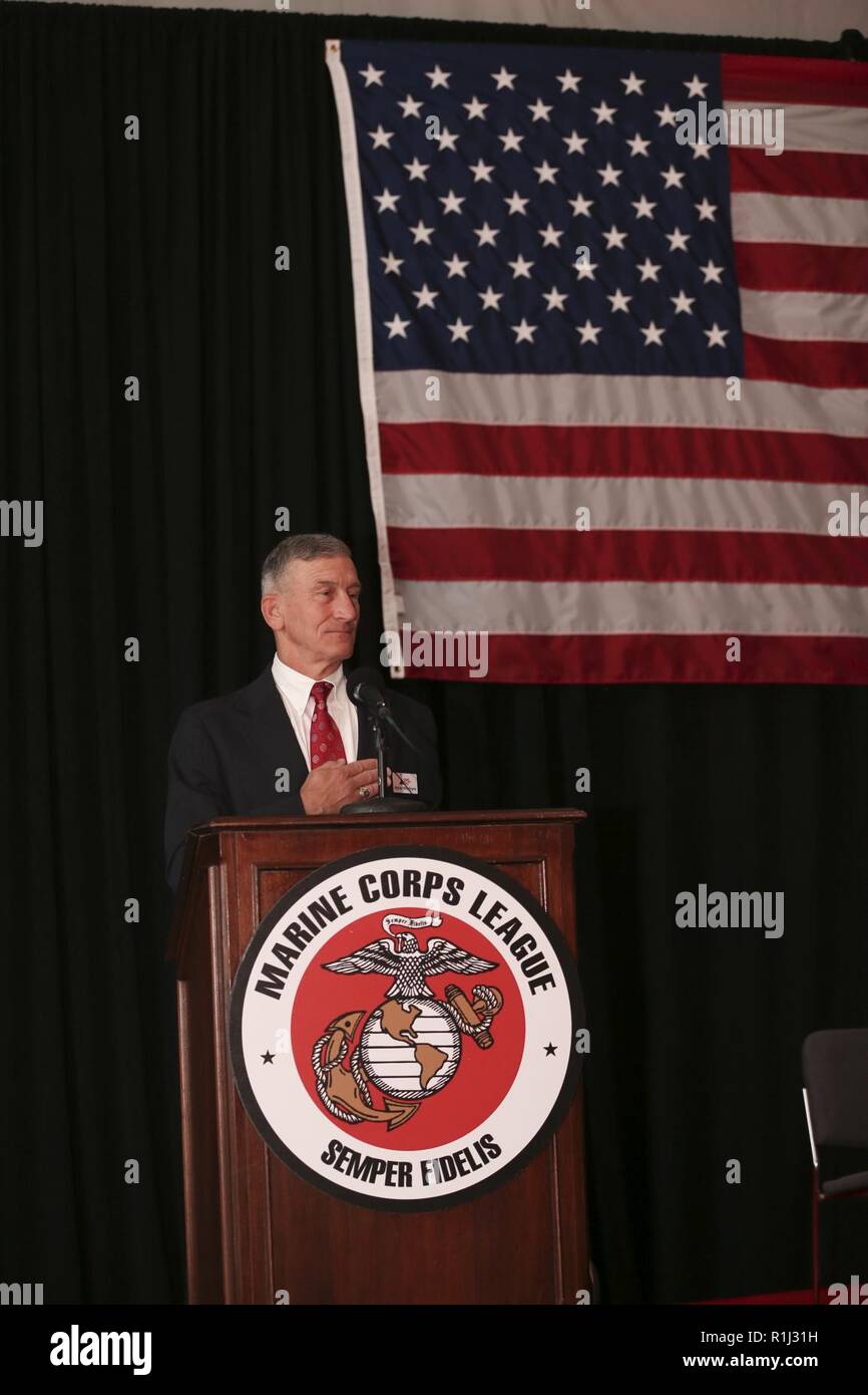 Retired U.S. Marine Corps Maj. Gen. Mike Regner honors the playing of ...