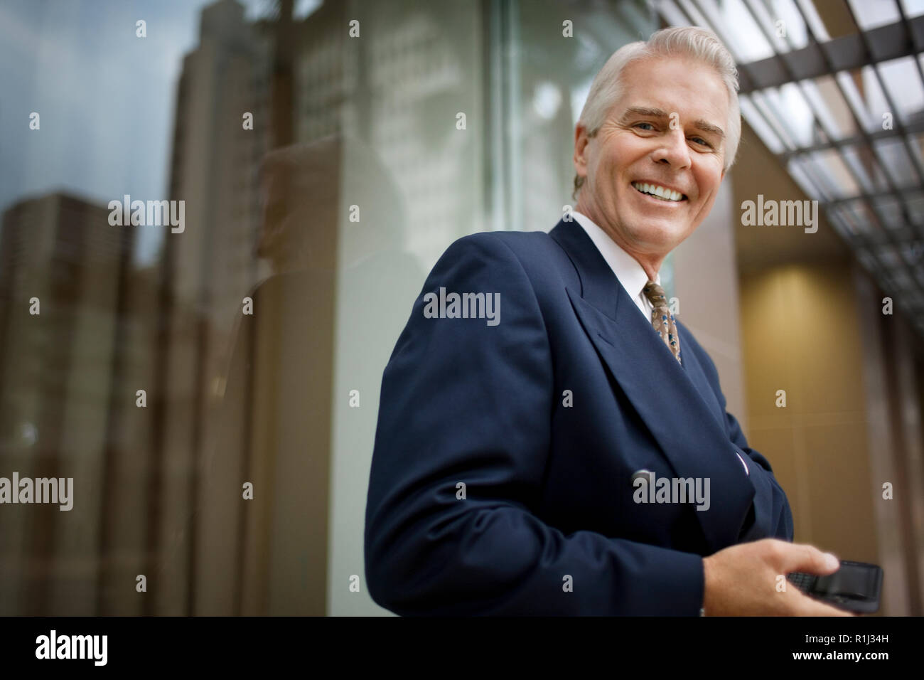 Businesspeople portrait happy low hi-res stock photography and images ...