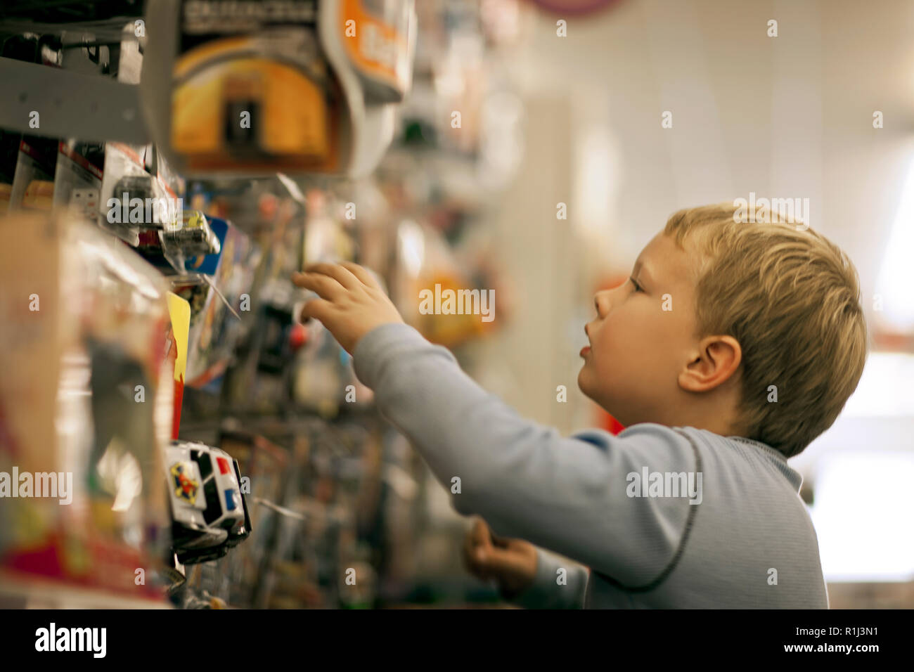 Objects kids toys looking boy childhood side hi-res stock photography ...