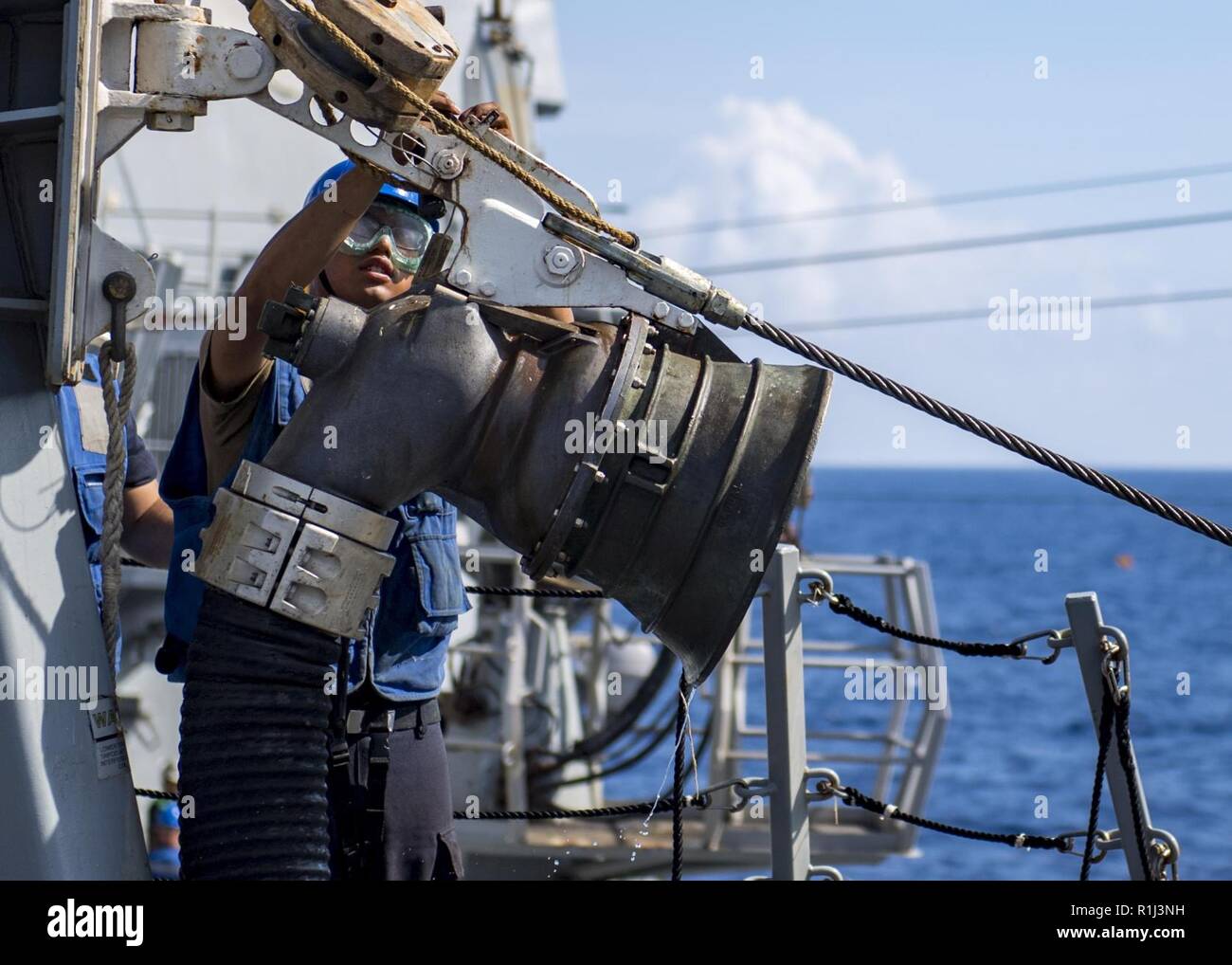 SOUTH CHINA SEA (Sept 26, 2018) Seaman Ericjay Celino releases a ...