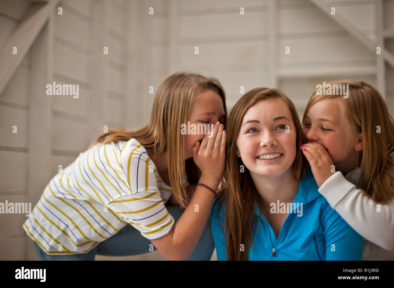 Top teenager togetherness whispering hi-res stock photography and ...
