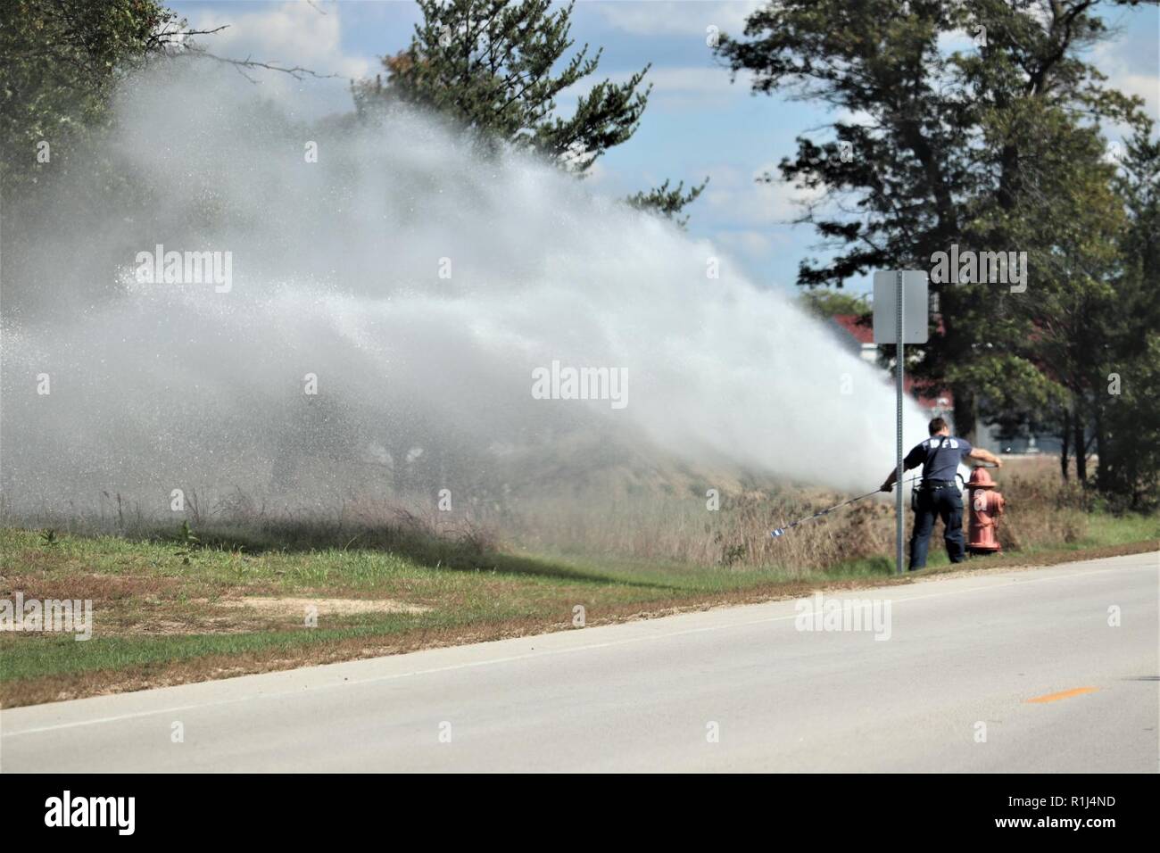Wisconsin hydrant flushing hi-res stock photography and images - Alamy
