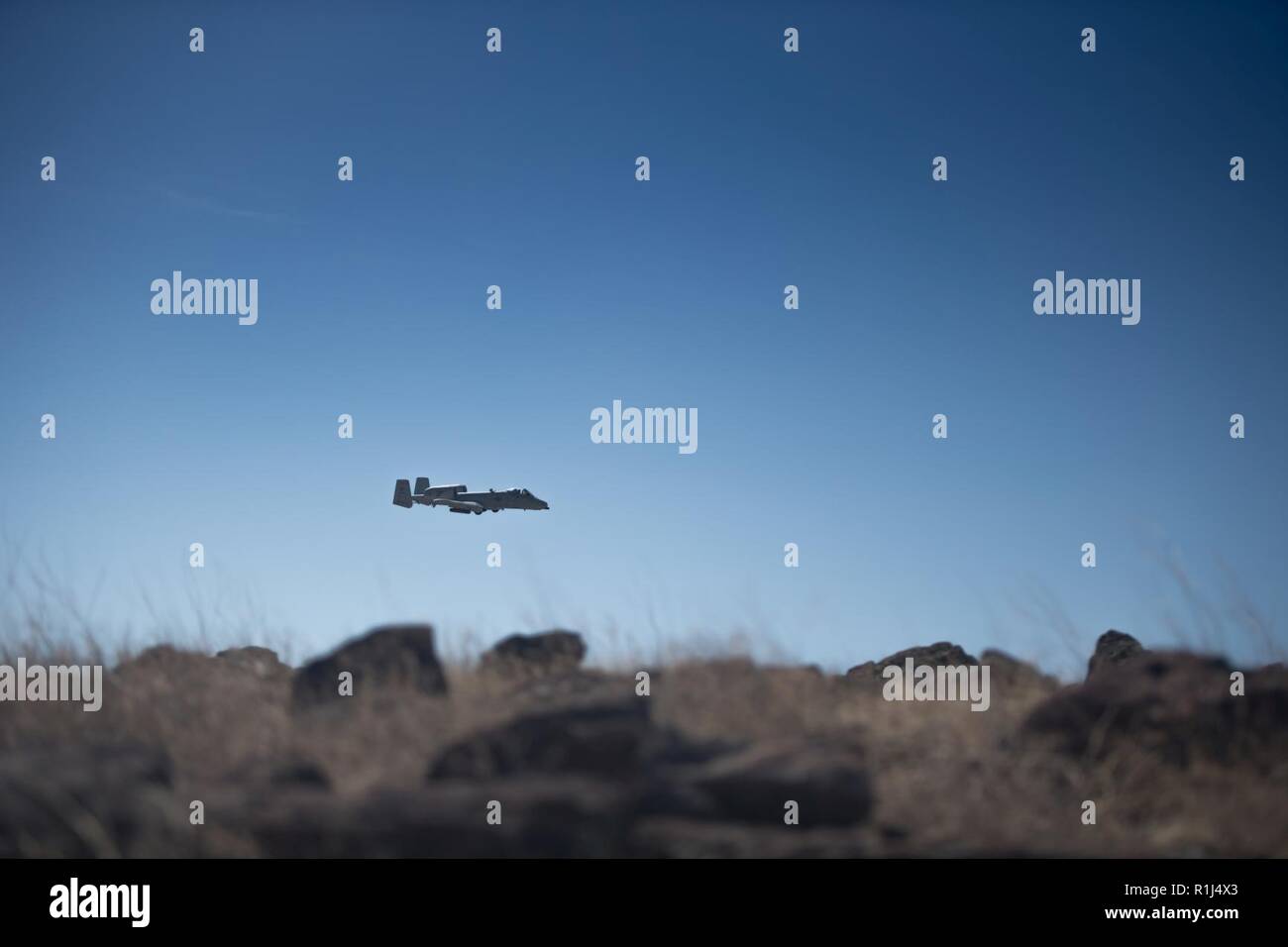 An A-10 Thunderbolt II conducts a show of force over an observation ...