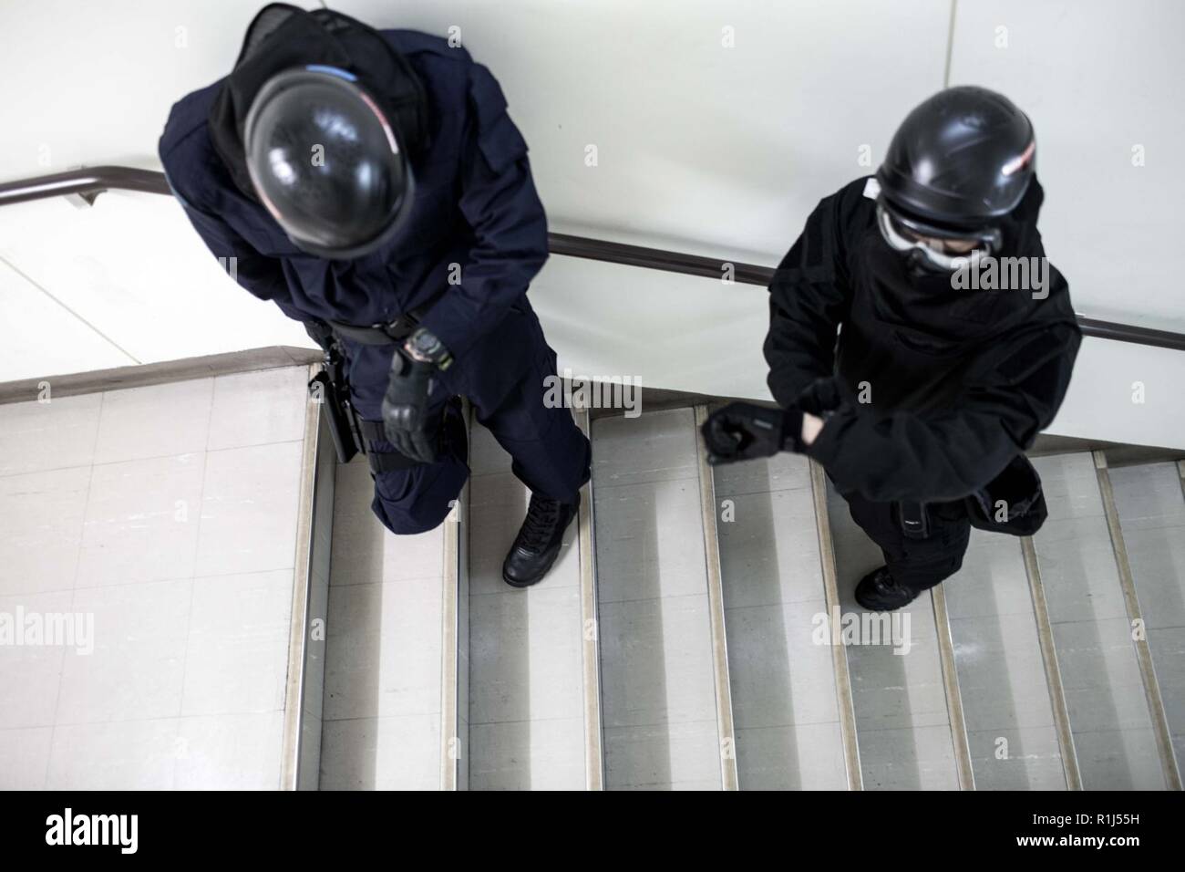 Two students from the Japan National Police Agency plan their method of ...