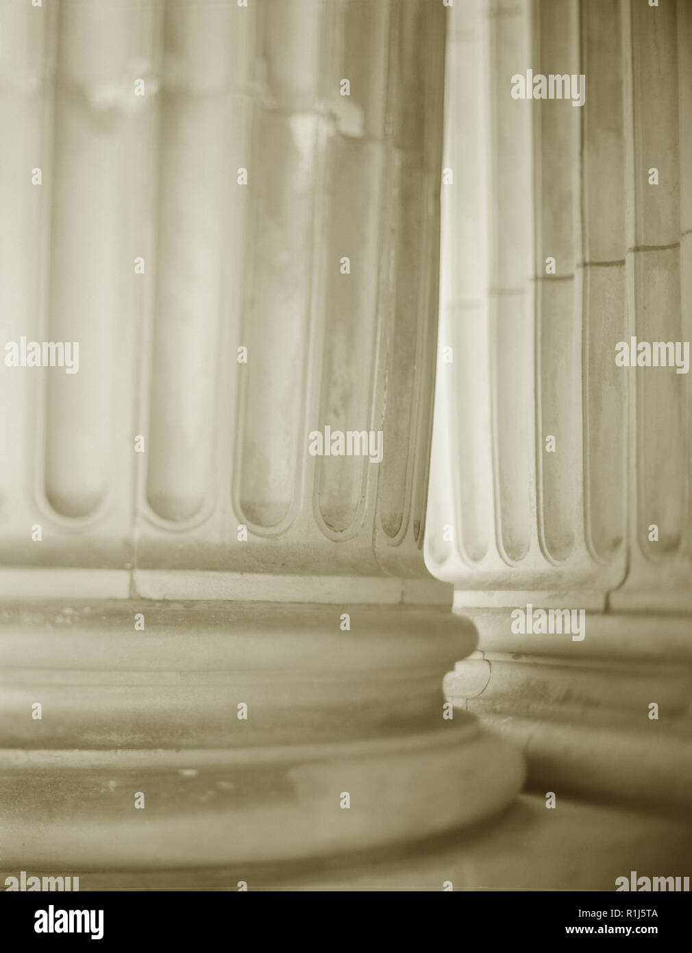 View of a section of thick pillars Stock Photo - Alamy