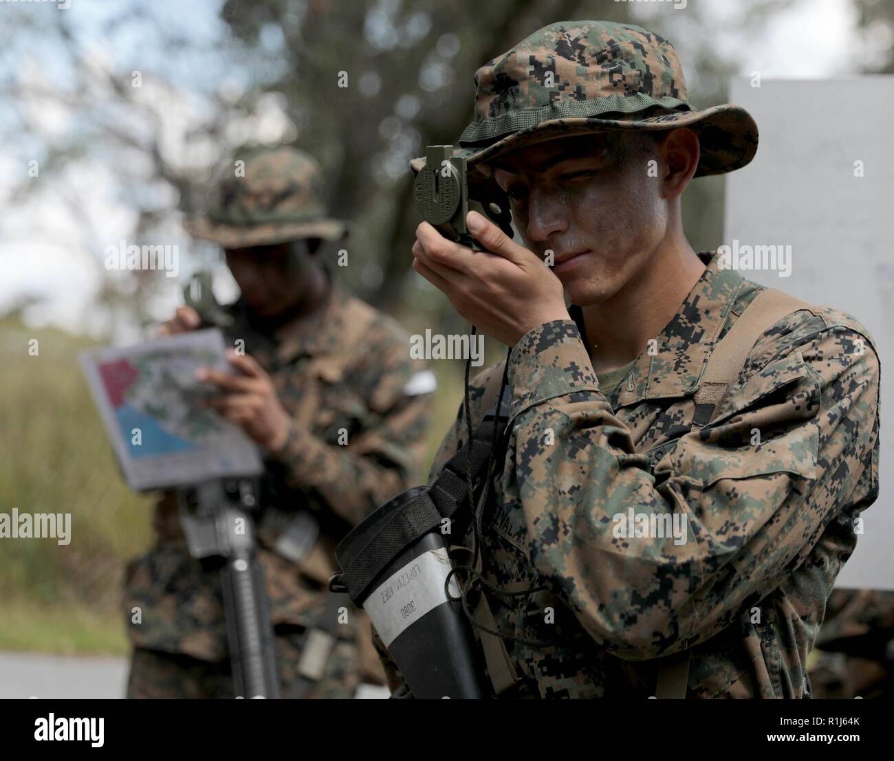 A recruit with Mike Company, 3rd Recruit Training Battalion, looks ...