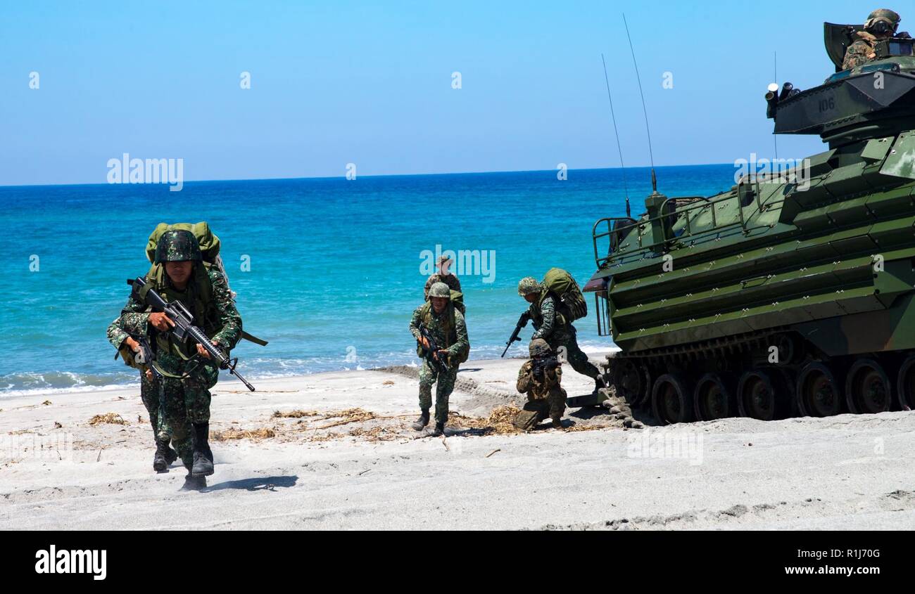 U.S. Marines and Philippine marines conduct an amphibious landing ...