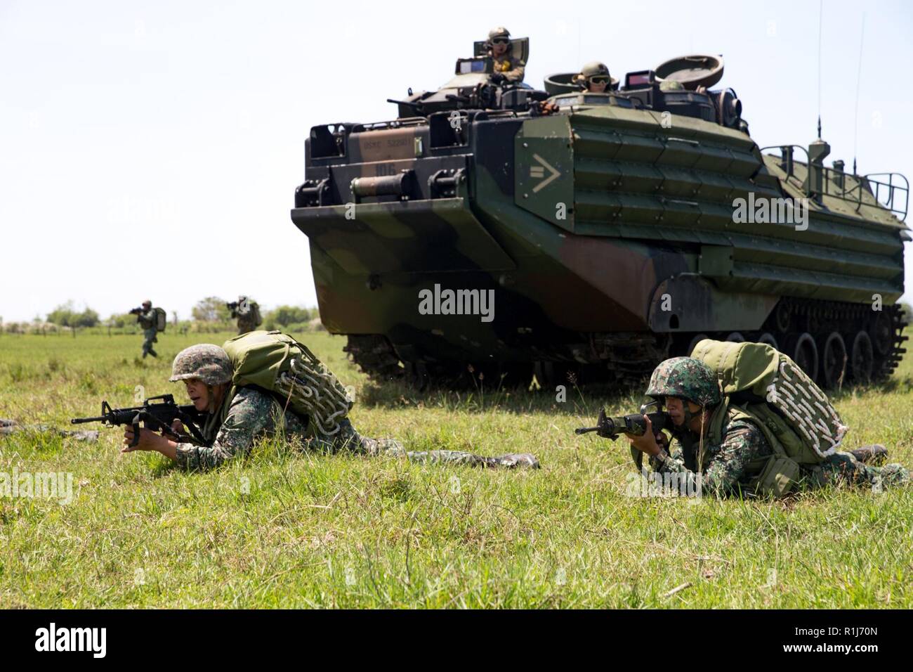 Philippine Marines post security during an amphibious landing as part ...