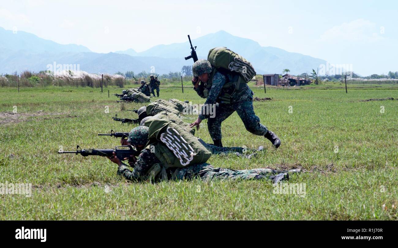A Philippine Marine gets accountability of his squad members during an ...